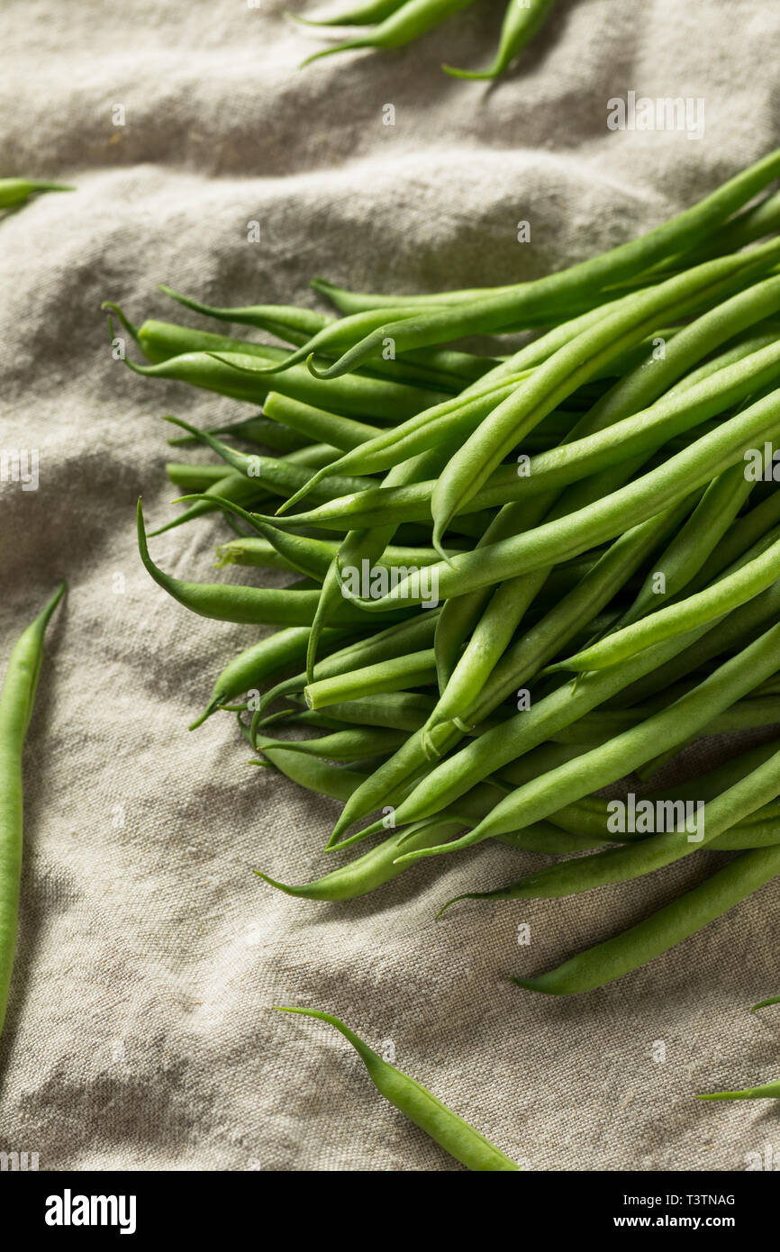 Raw Green Organic French String Beans Ready to Cook Stock Photo - Alamy