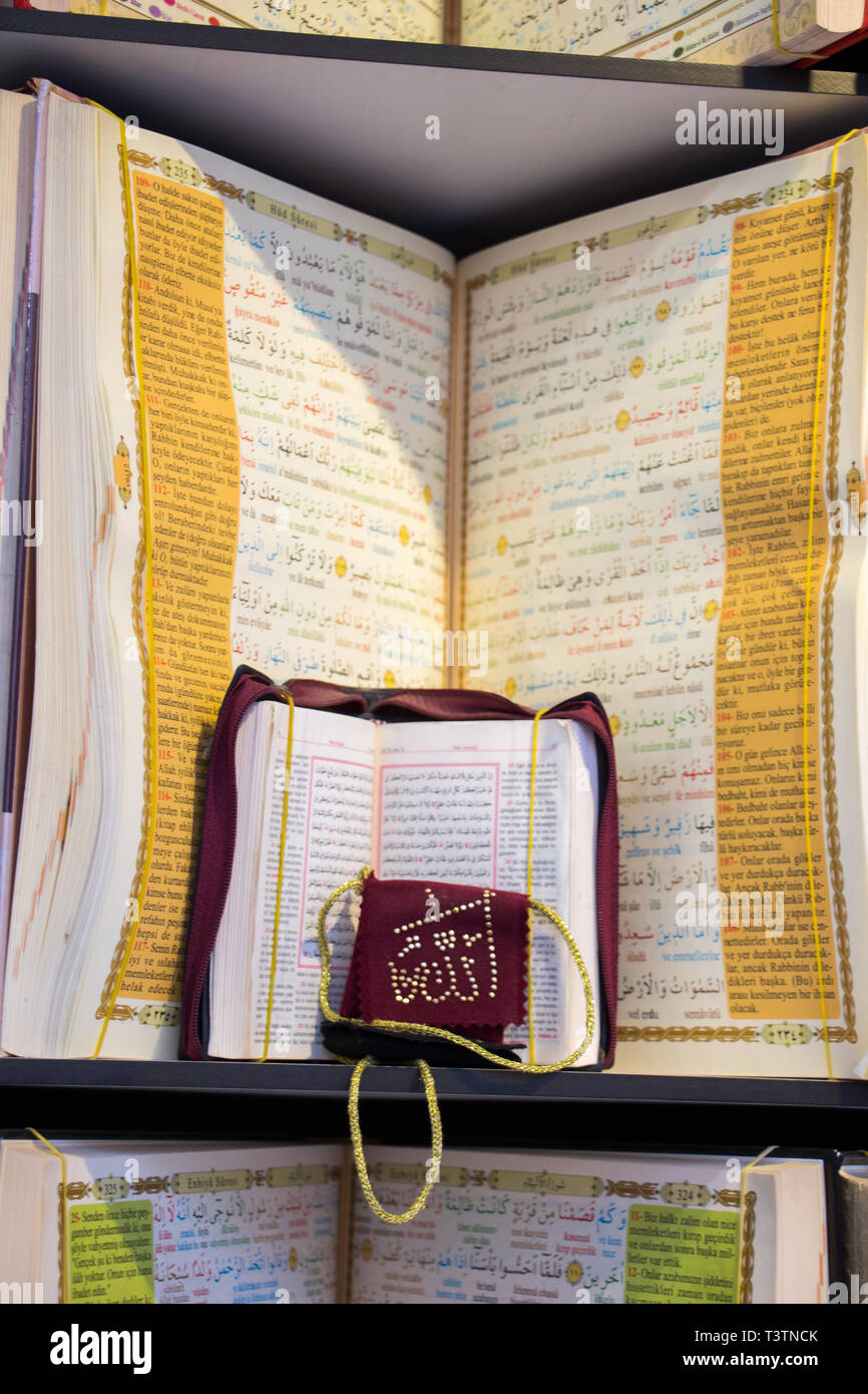 Islamic Holy Book Quran on the market shelf Stock Photo - Alamy