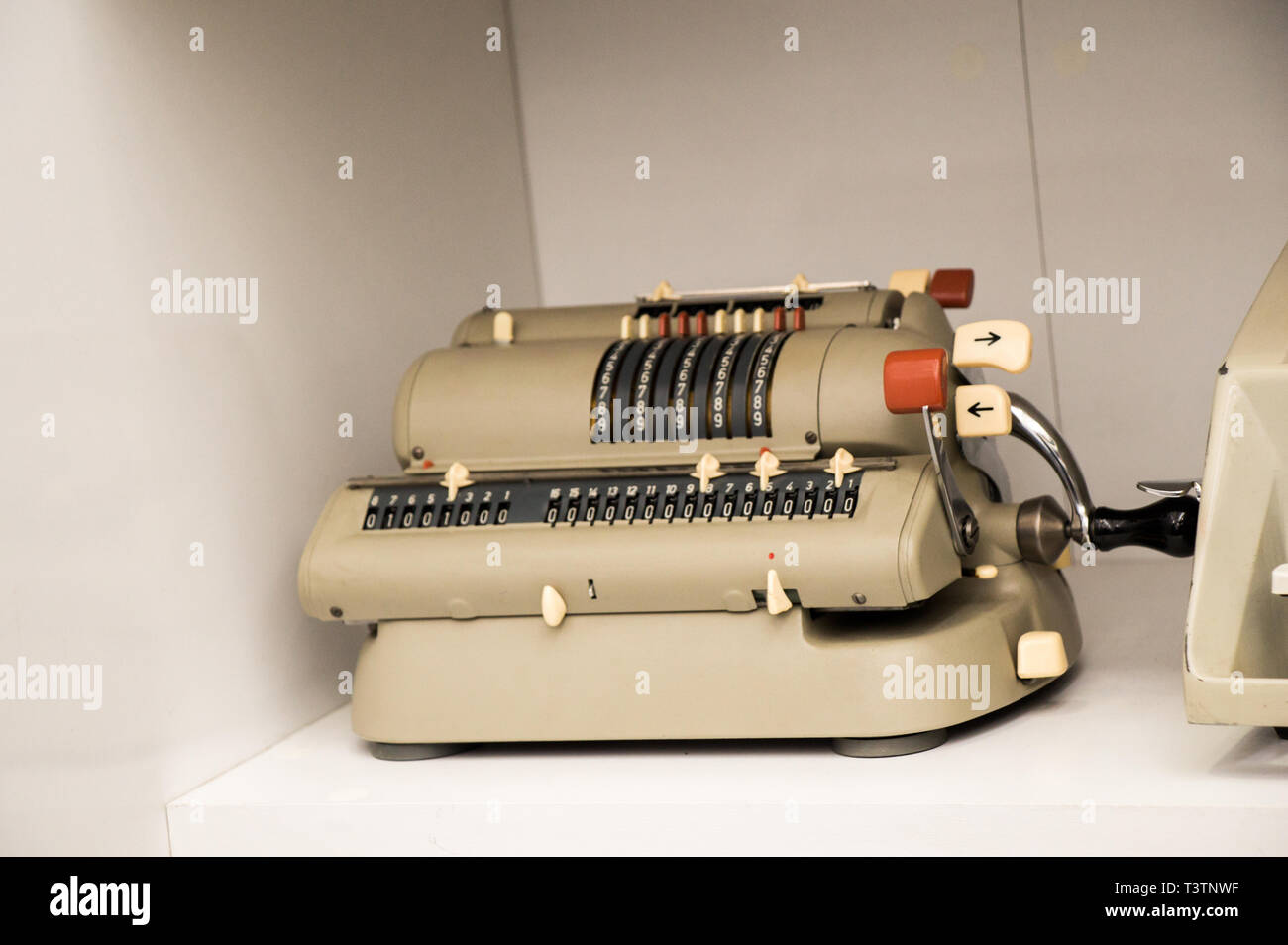 Retro syled tiny typewriter model on a white background Stock Photo - Alamy