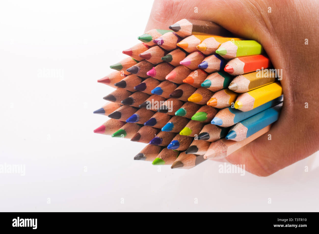 Hand holding Color pencils on a white background Stock Photo - Alamy
