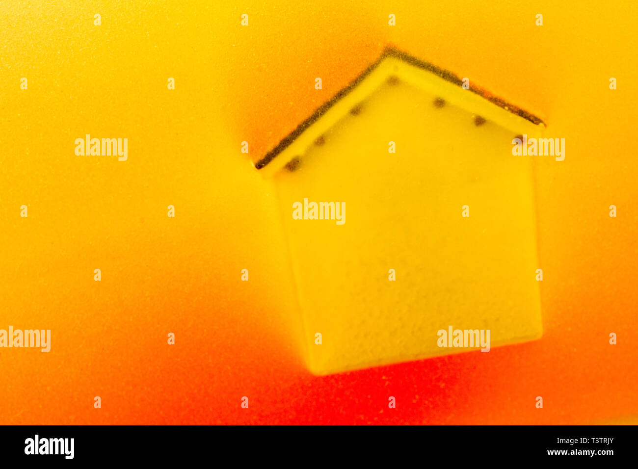 Little model house on a color background in the view Stock Photo - Alamy