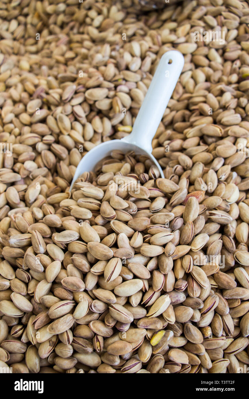 Pistachio nuts with shell ready to eat Stock Photo - Alamy