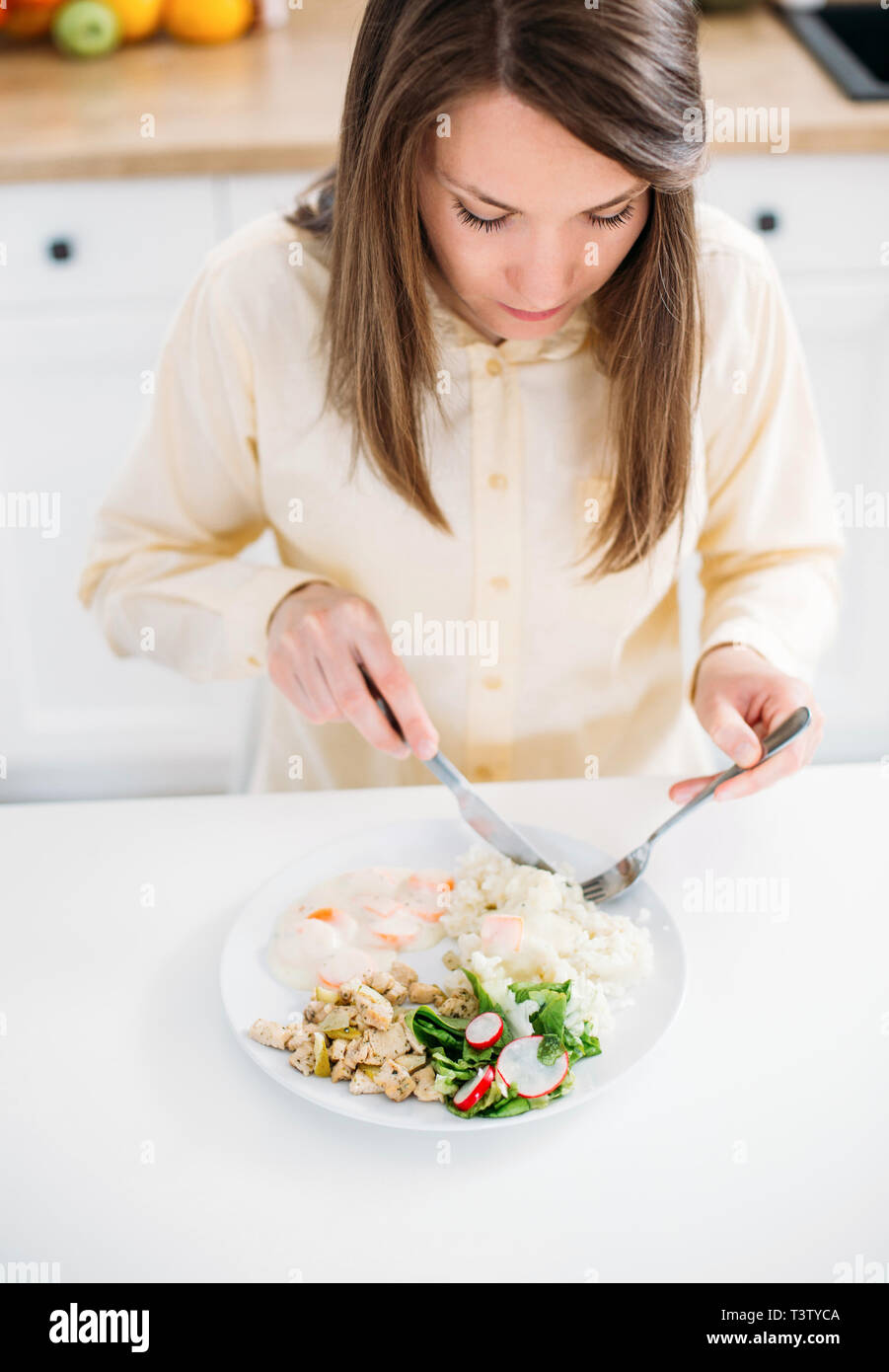 Happy girl eating healthy food hi-res stock photography and images - Alamy
