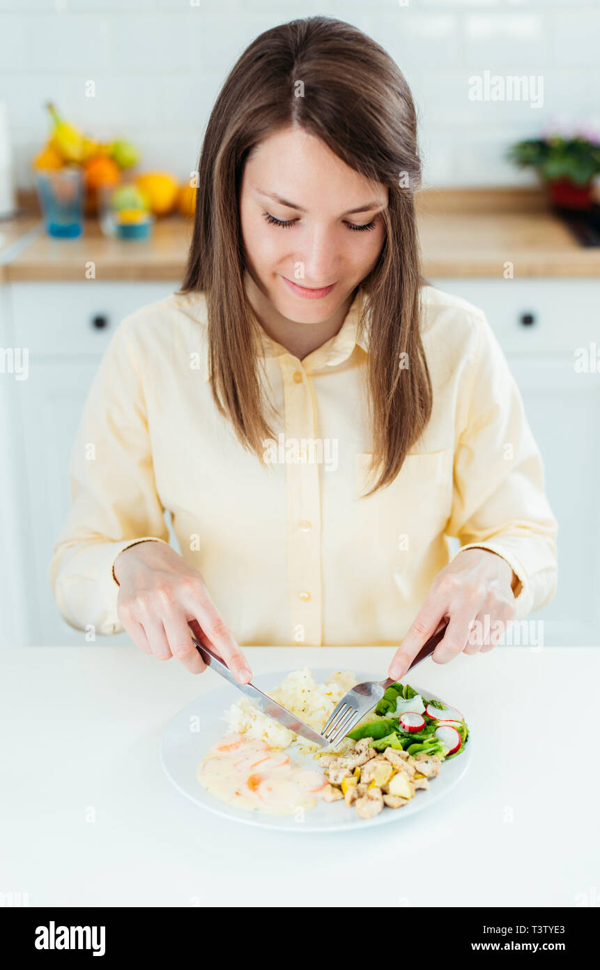 Woman eating happy meal hi-res stock photography and images - Alamy