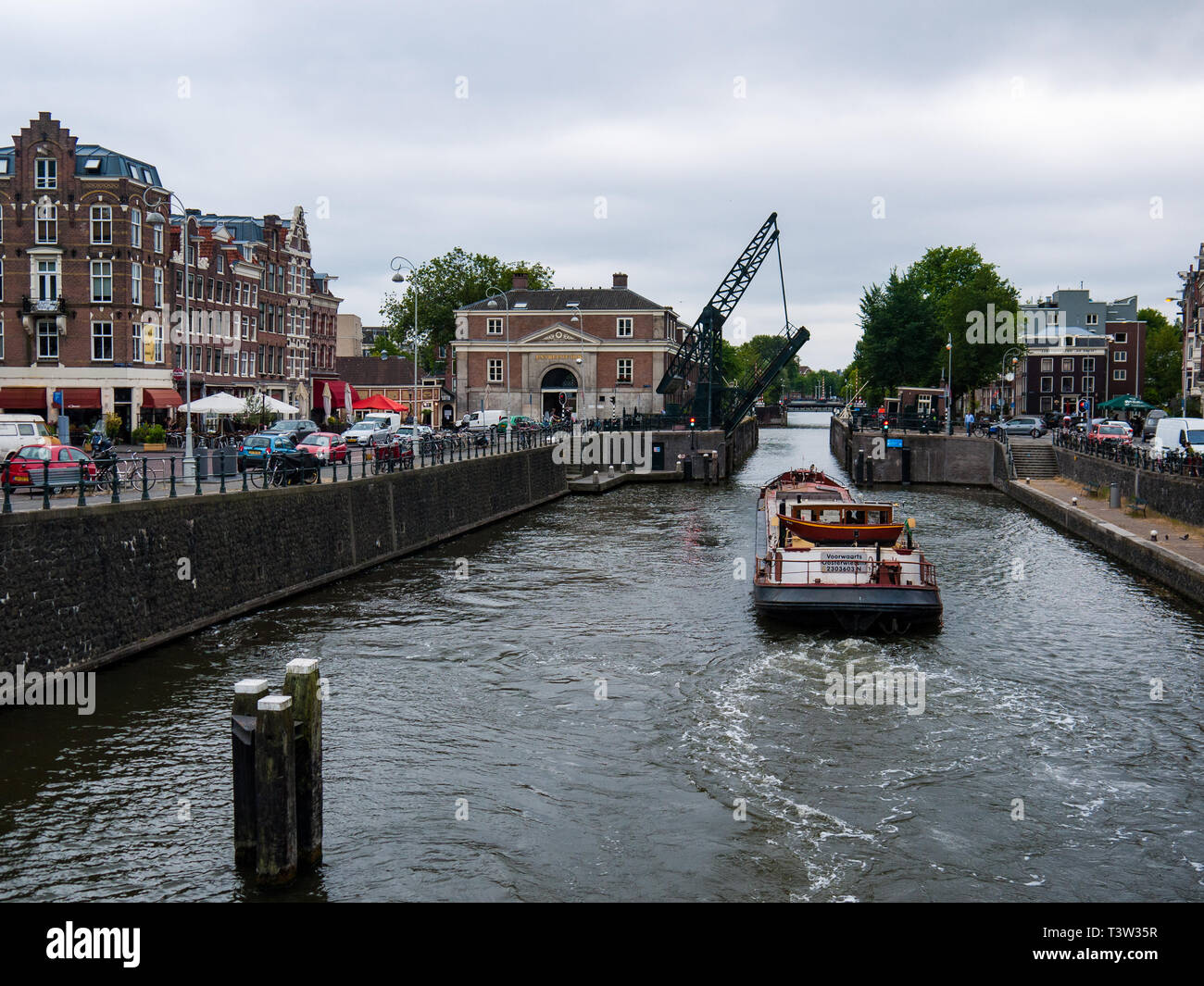 Dutch barge on a canal, Amsterdam, Netherlands Stock Photo - Alamy