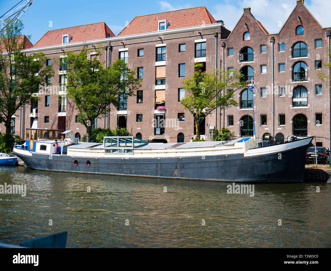 Dutch barge on a canal, Amsterdam, Netherlands Stock Photo - Alamy
