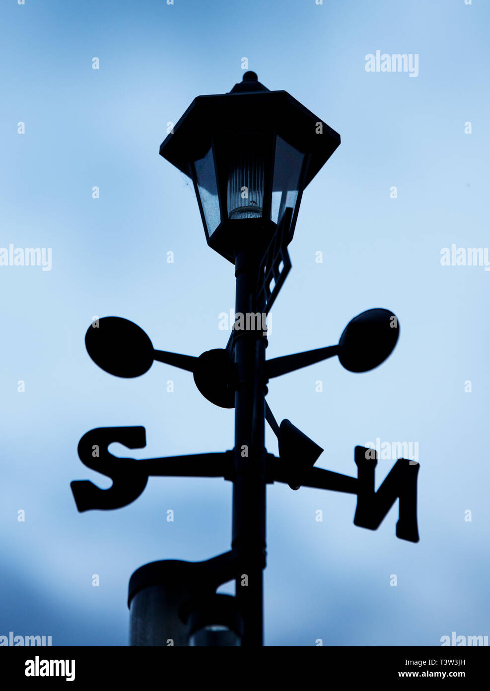 lantern with cardinal direction at dusk measuring wind speed Stock ...
