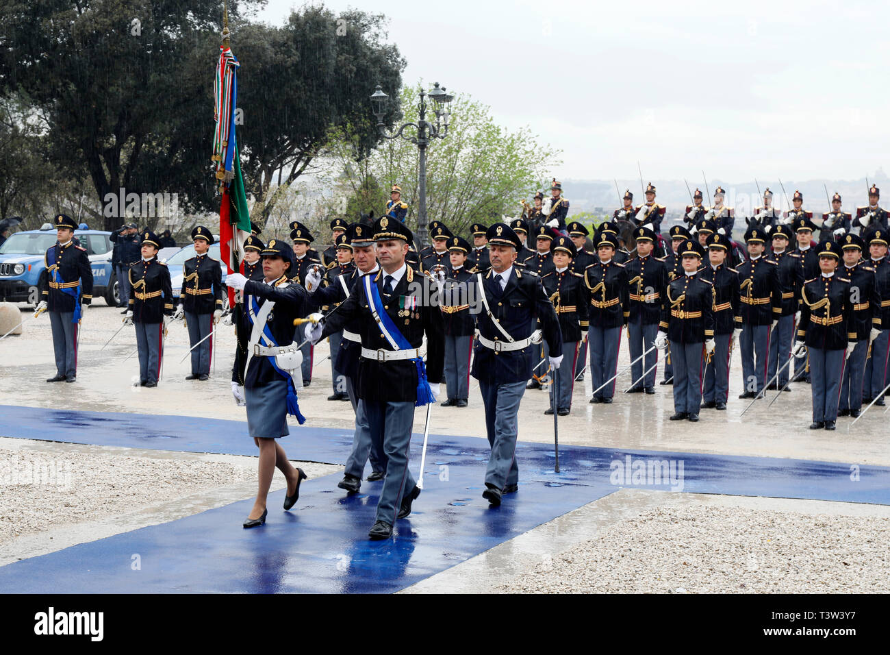 Rome, Italy - April 10, 2019: the police line-up with the Italian flag ...