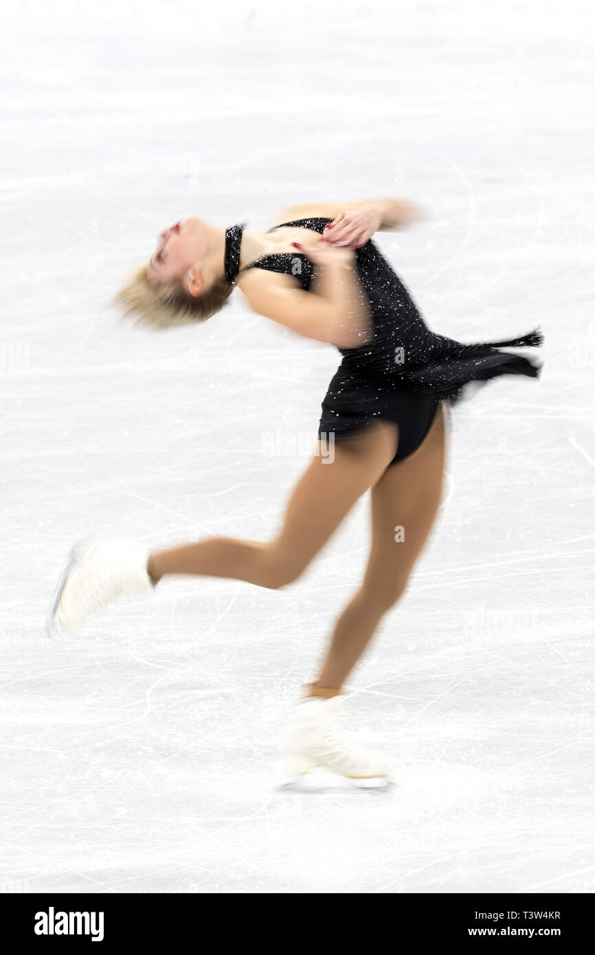 Blur motion action of Larkyn Austman (CAN) competing in the Figure ...