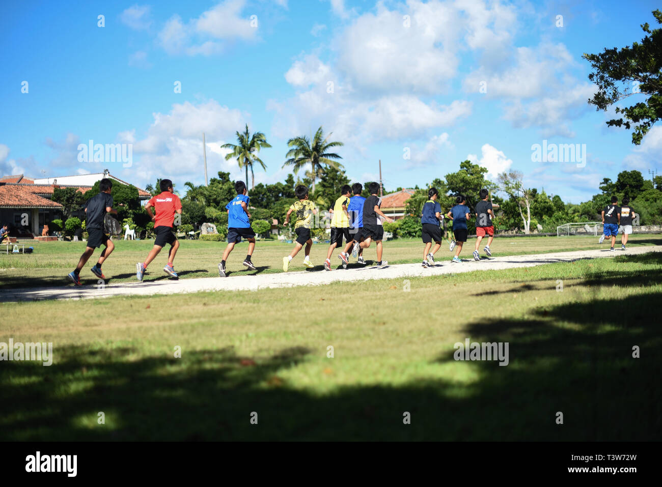 Kids running during training, Taketomi Island, Okinawa Prefecture ...