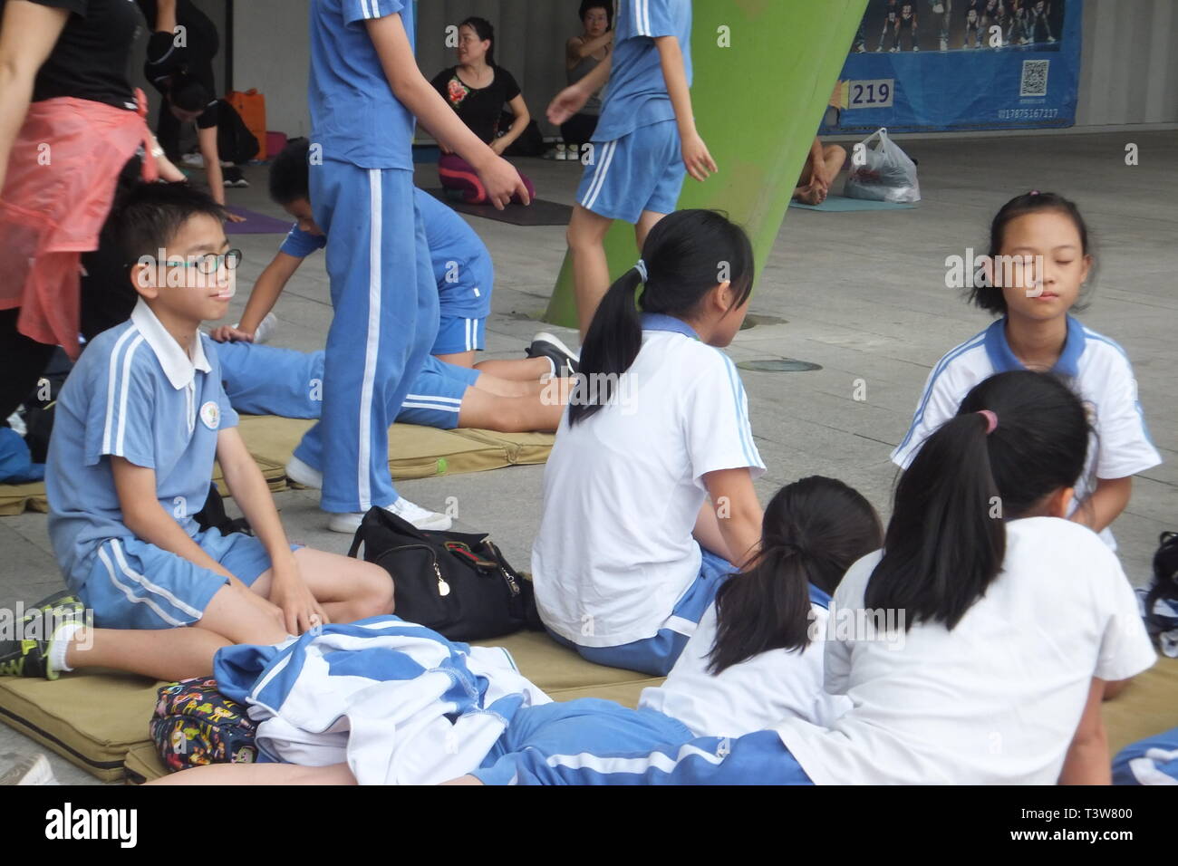 Shenzhen, China: middle school students take a break during the sports ...