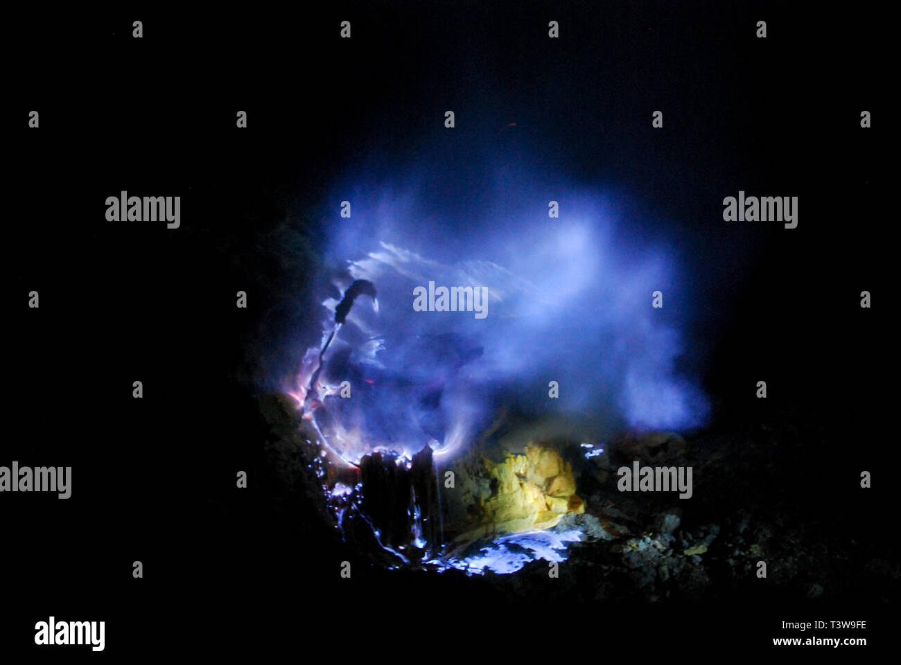 Blue fire from burning sulphur on Ijen Volcano, Java, Indonesia Stock ...
