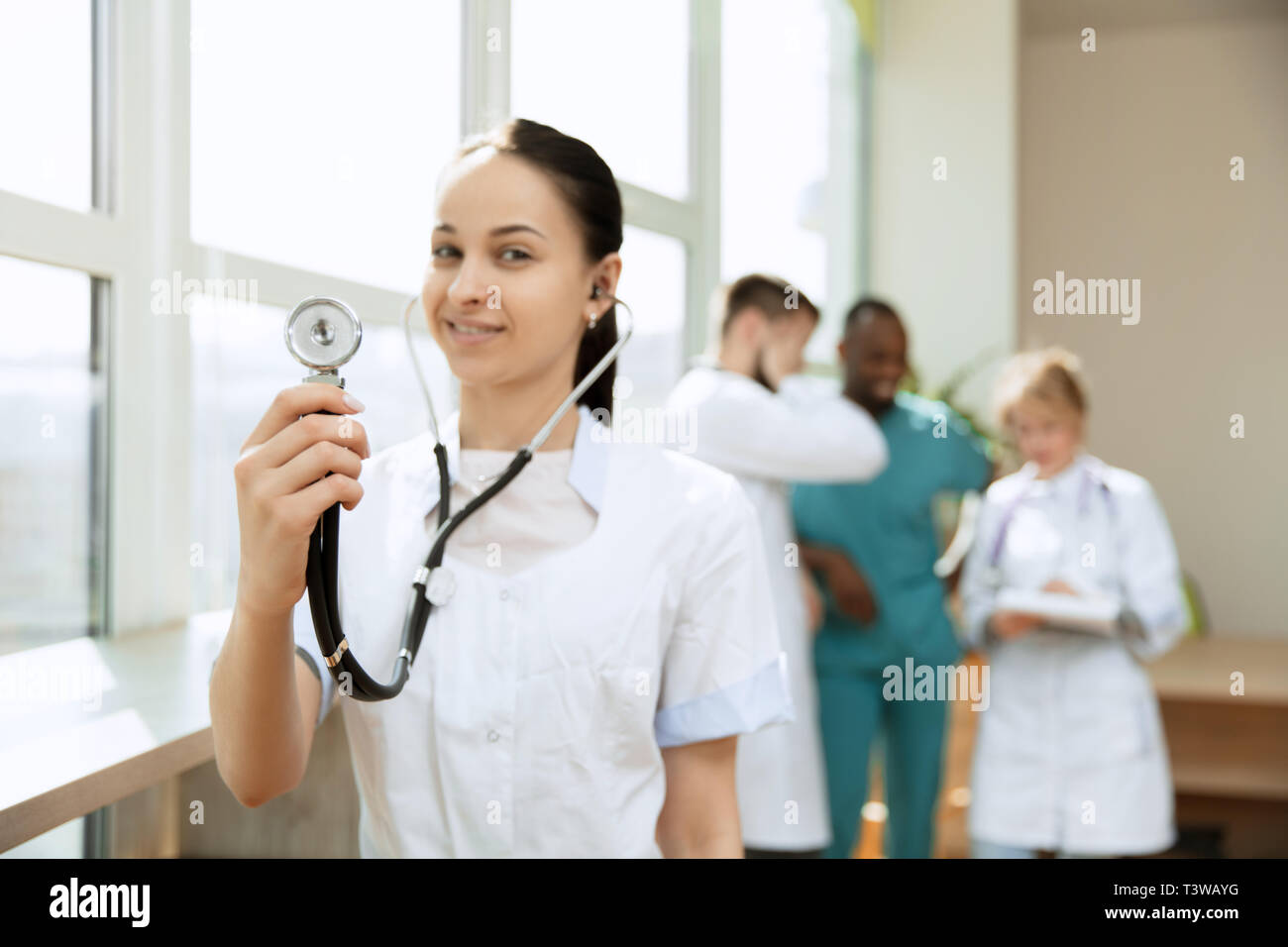 Healthcare people group. Professional female doctor posing at hospital ...
