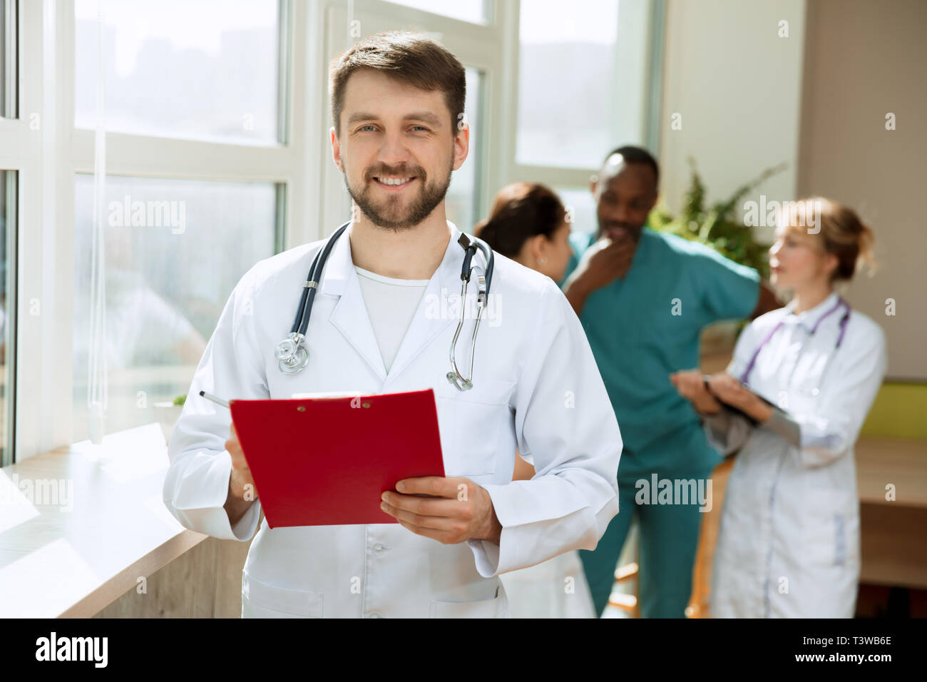 Healthcare people group. Professional male doctor posing at hospital ...