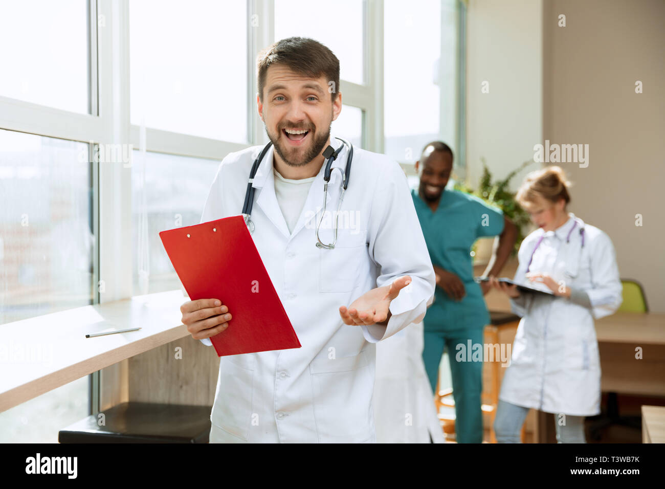 Healthcare people group. Professional male doctor posing at hospital ...