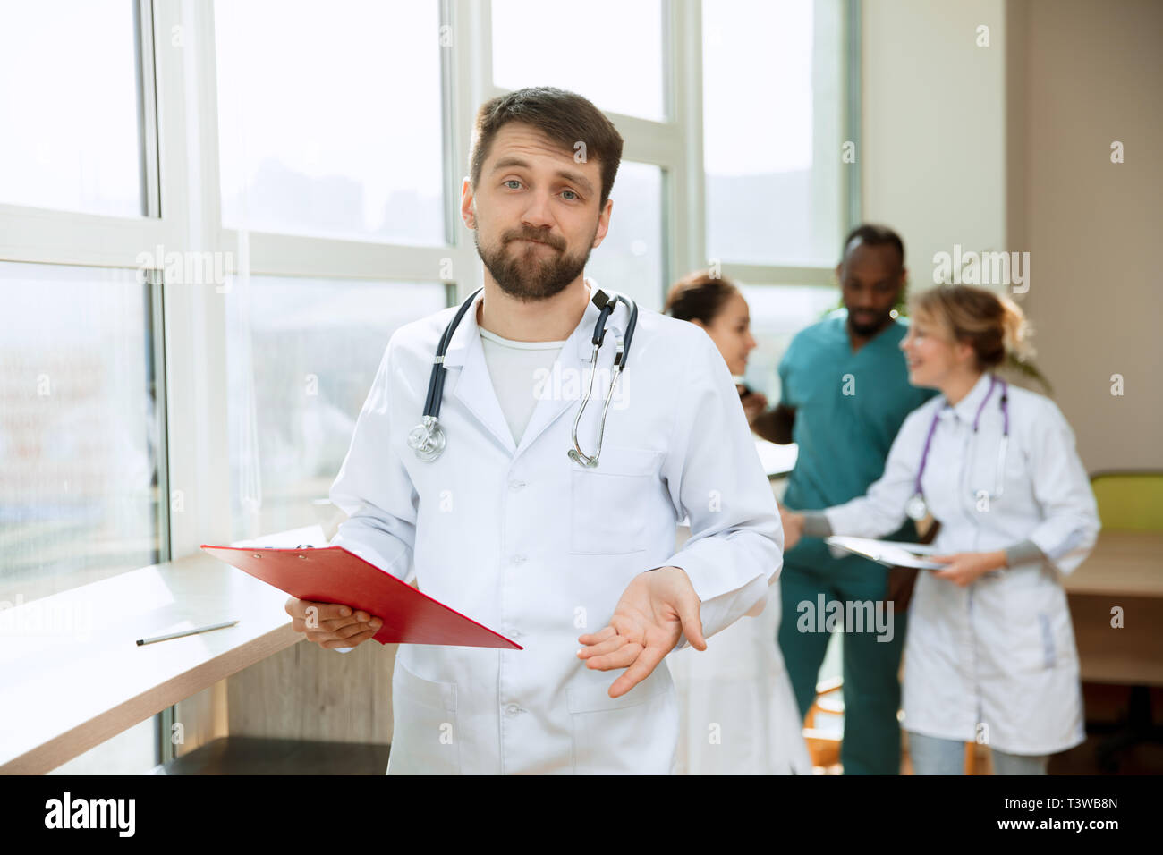 Healthcare people group. Professional male doctor posing at hospital ...