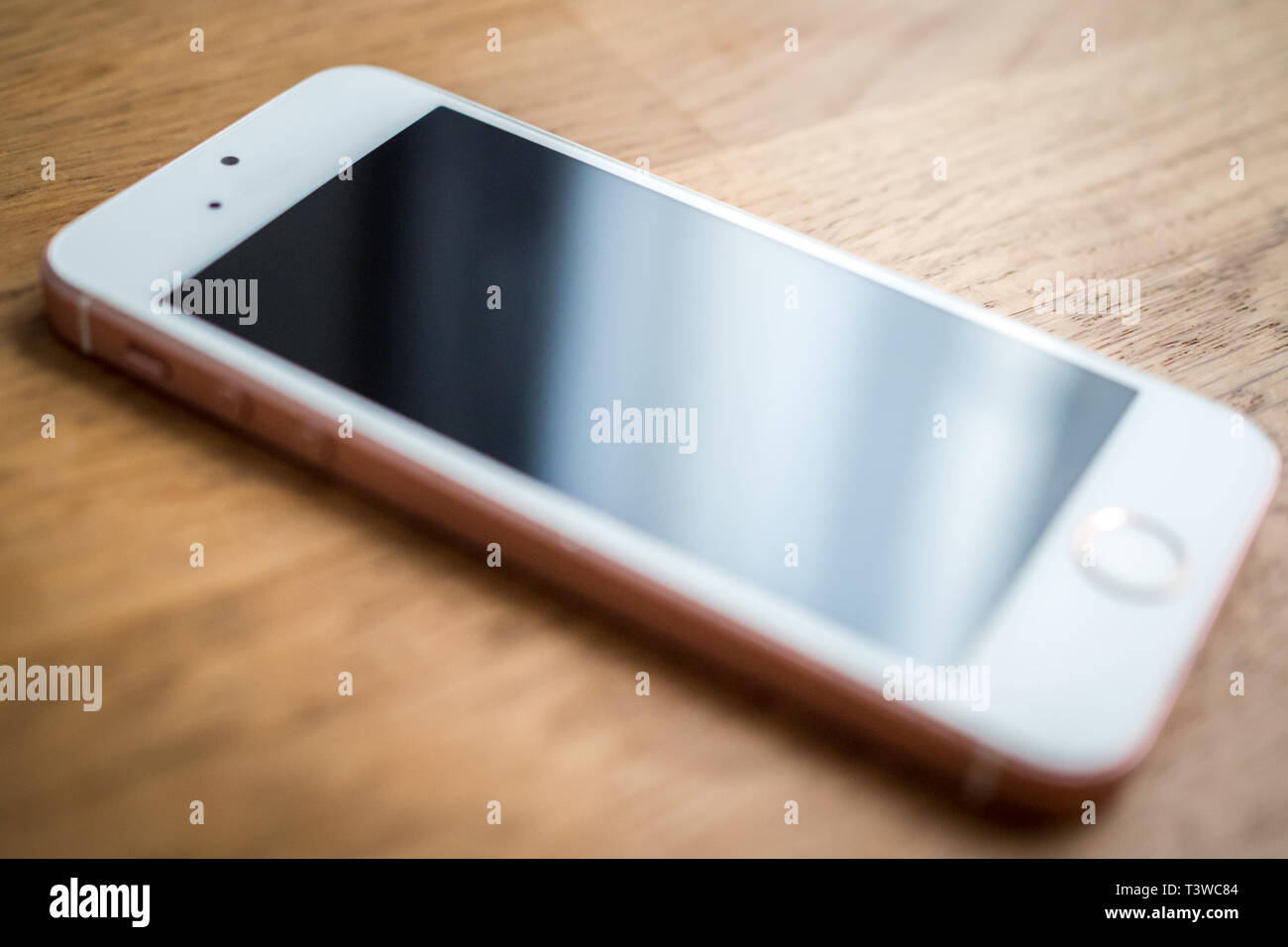 Modern Elegant Smart Phone on a desk Stock Photo - Alamy