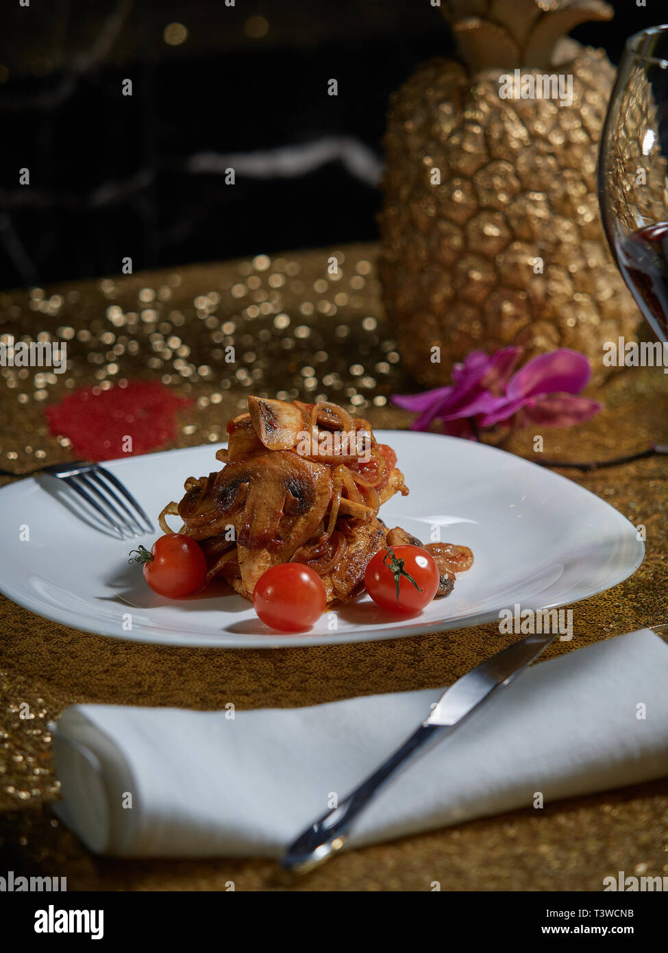 Small cuts of meat cooked along with fried mushrooms and onions are ...