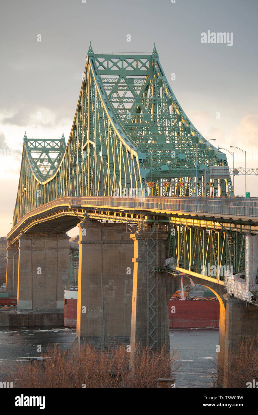 Bridge over urban river Stock Photo - Alamy