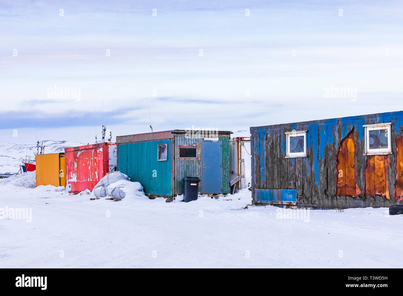 Colorful steel shipping containers on the waterfront in Hólmavík are ...