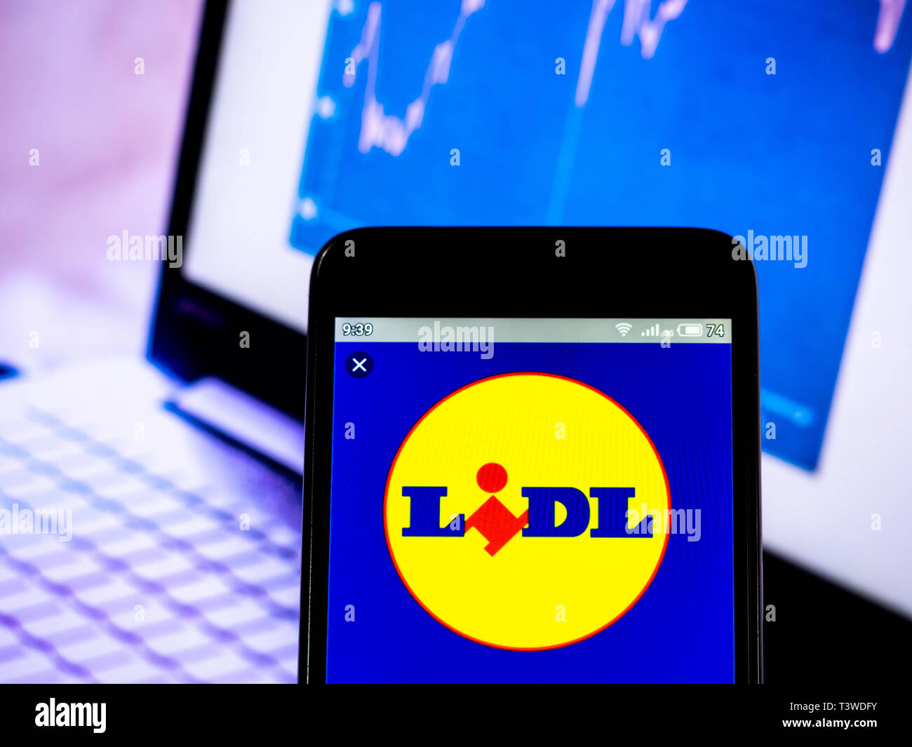 In this photo illustration a Lidl logo seen displayed on a smart phone ...