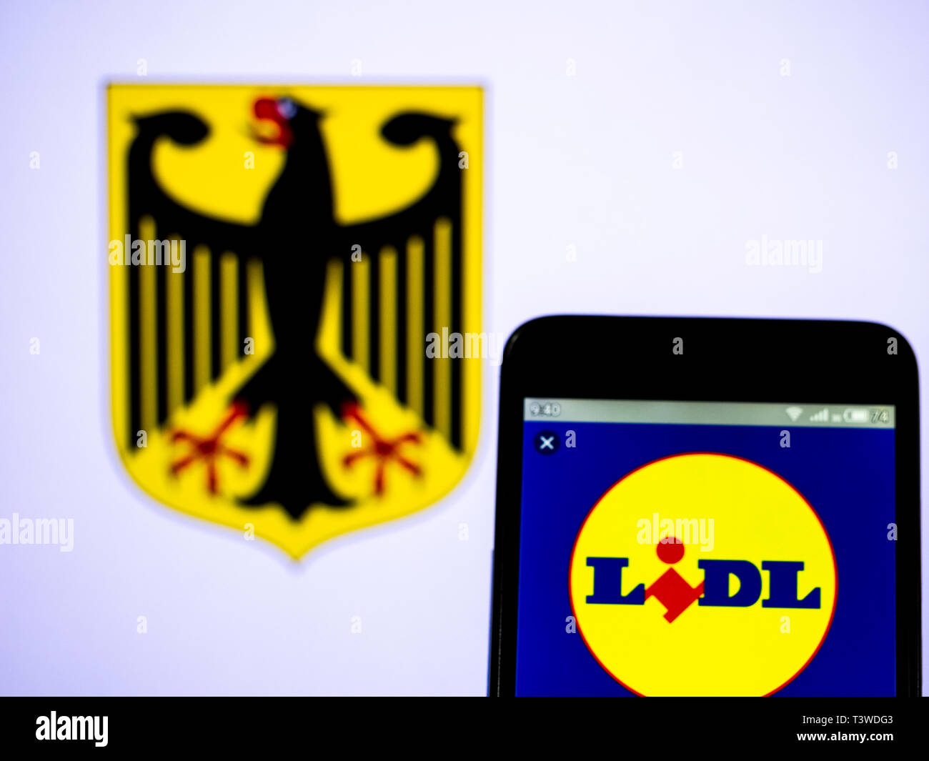 In this photo illustration a Lidl logo seen displayed on a smart phone ...