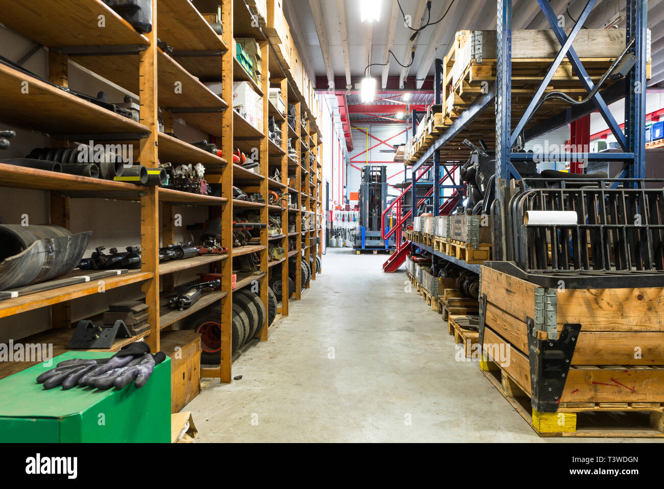 Shelves, tools and aisles in warehouse Stock Photo - Alamy