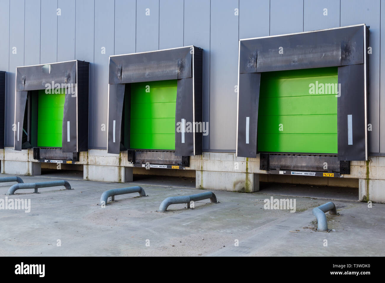 Green loading ramp doors for loading trruck at a distribution center ... Green loading ramp doors for loading trruck at a distribution center ...