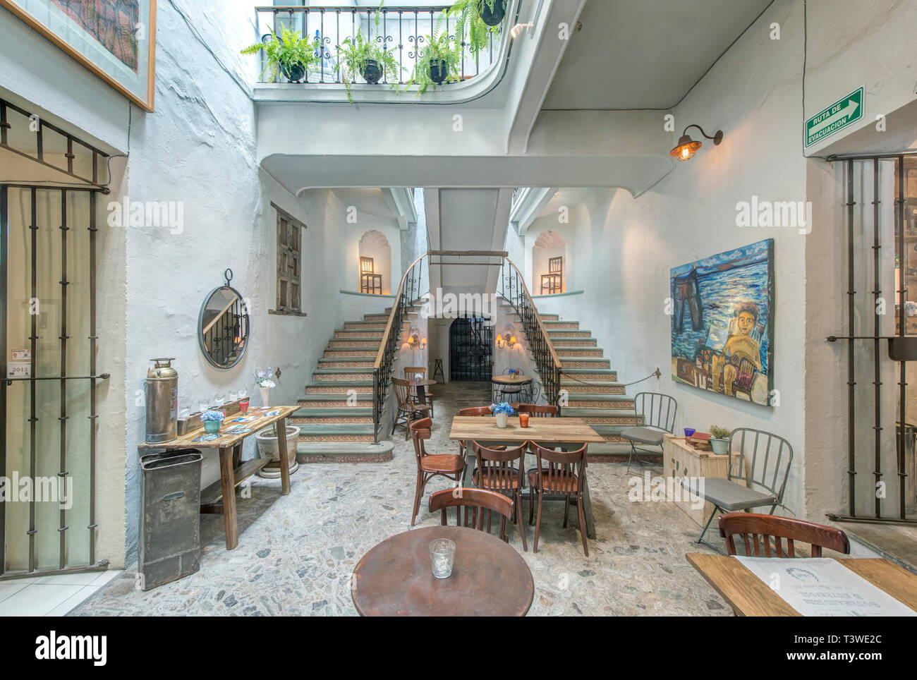 Balcony and staircase in traditional coffee shop Stock Photo - Alamy