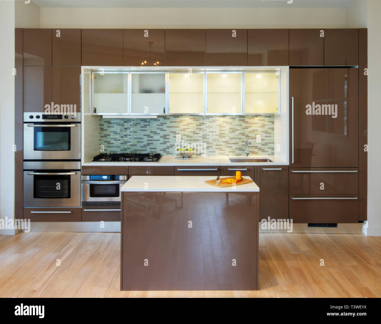 Counter and island in modern kitchen Stock Photo - Alamy