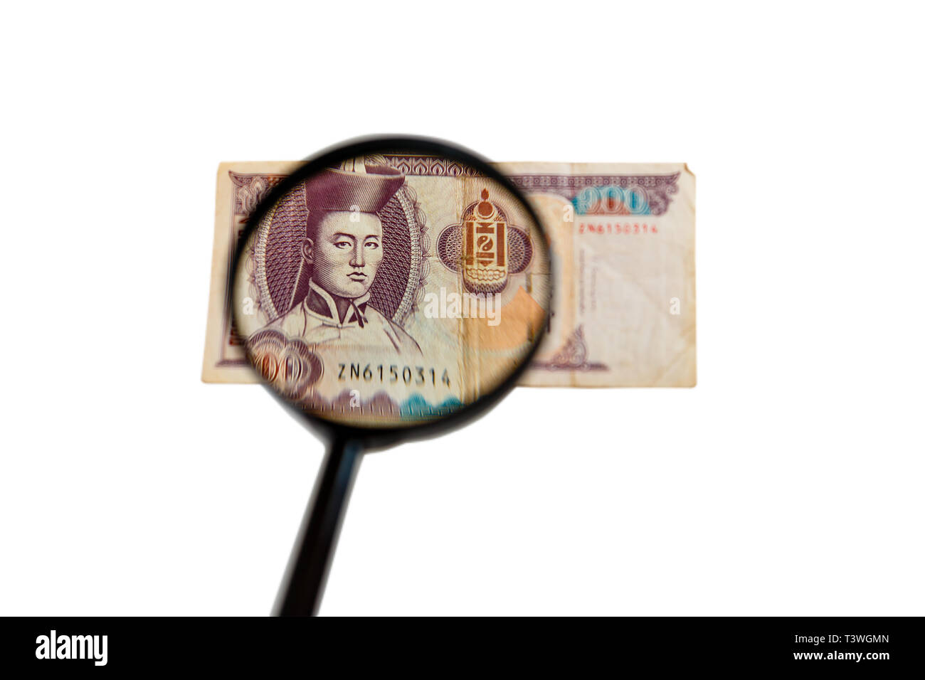 one hundred Mongolian tugriks bank note and magnifying glass isolated ...
