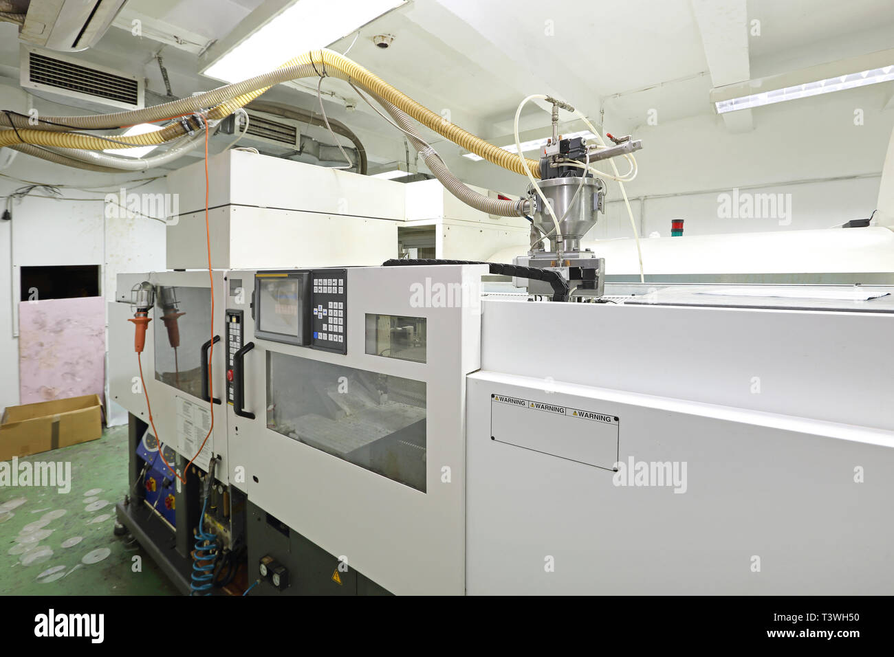 DVD and CD Manufacturing Machine in Factory Stock Photo - Alamy