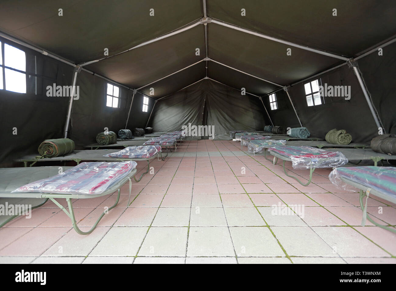 Tent Shelter With Temporary Beds Ready for Disaster Refuges Stock Photo ...