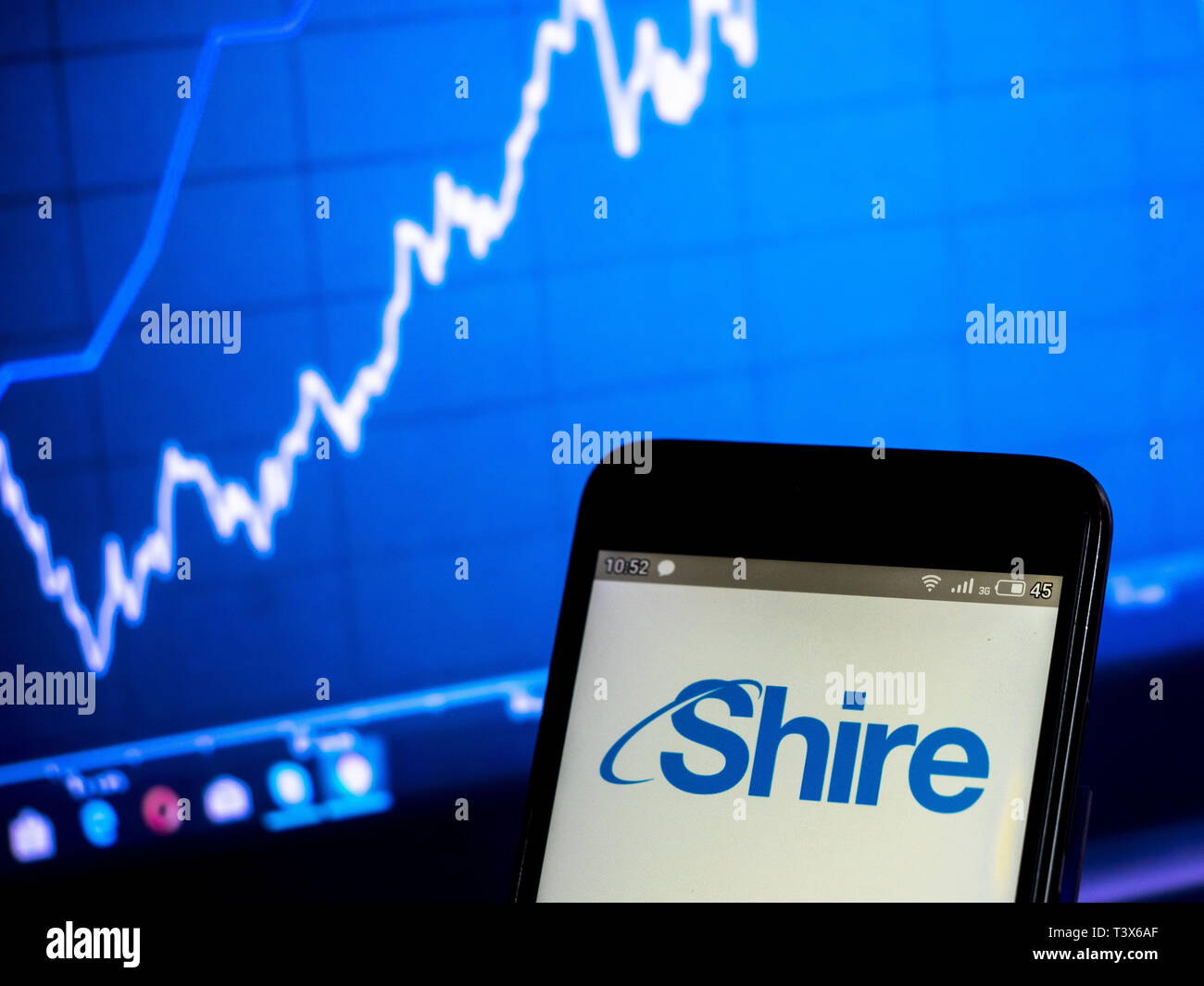 April 12, 2019 - Ukraine - In this photo illustration a Shire Plc logo ...
