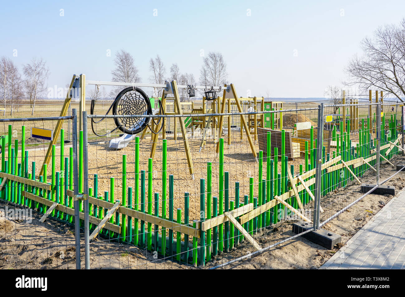 building a modern childrens playground in the city Stock Photo - Alamy