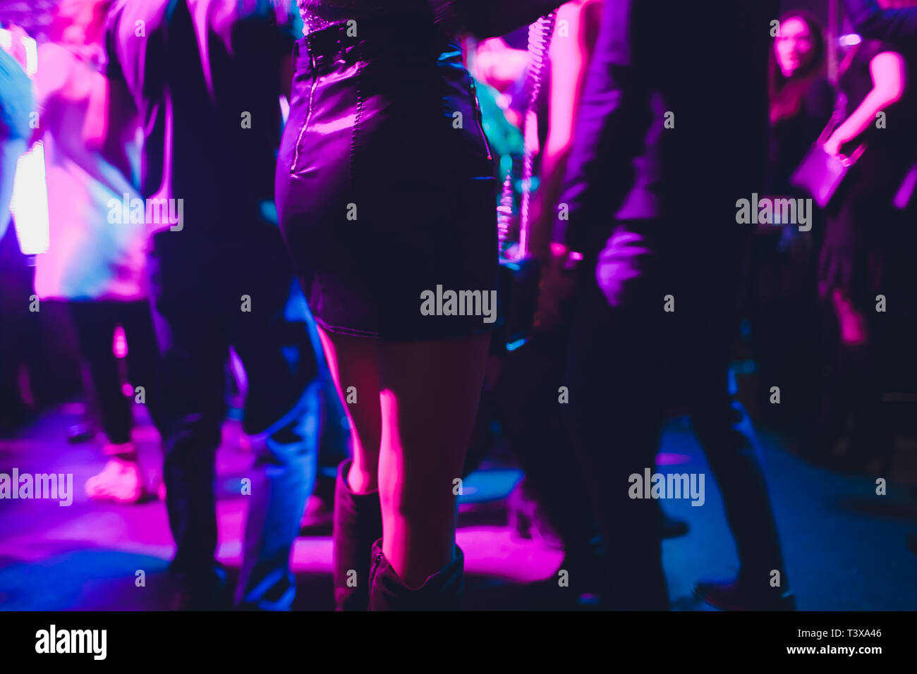 Legs of dancing people at the party Stock Photo - Alamy