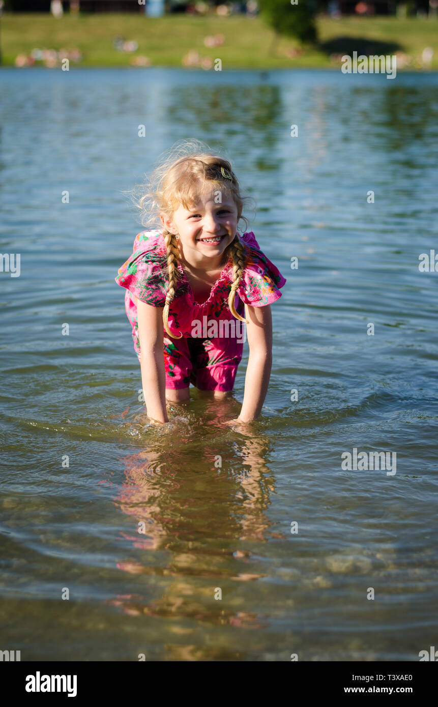 Cheerful blond girl hi-res stock photography and images - Alamy