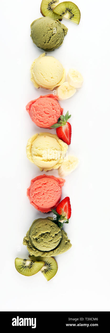 Set of ice cream scoops of different colors and flavours with berries ...