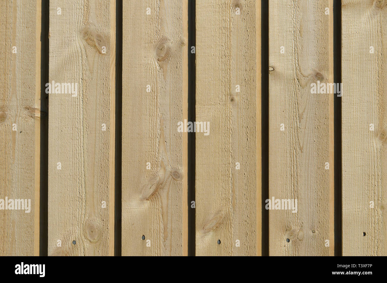 Timber wall with slots Stock Photo - Alamy