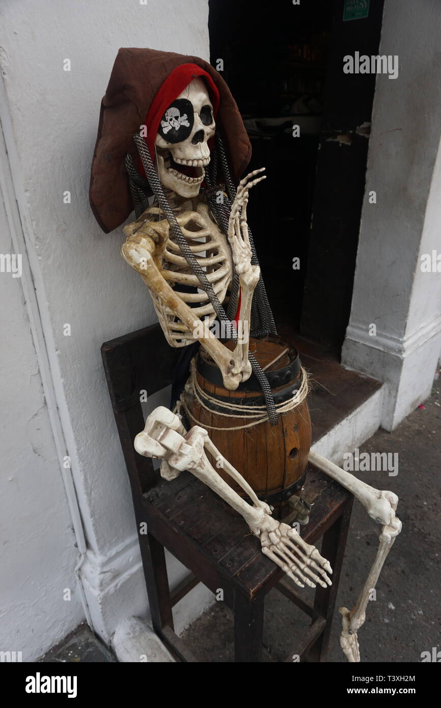 Seated, Waving Pirate Skeleton with Beer Barrel Belly Stock Photo - Alamy