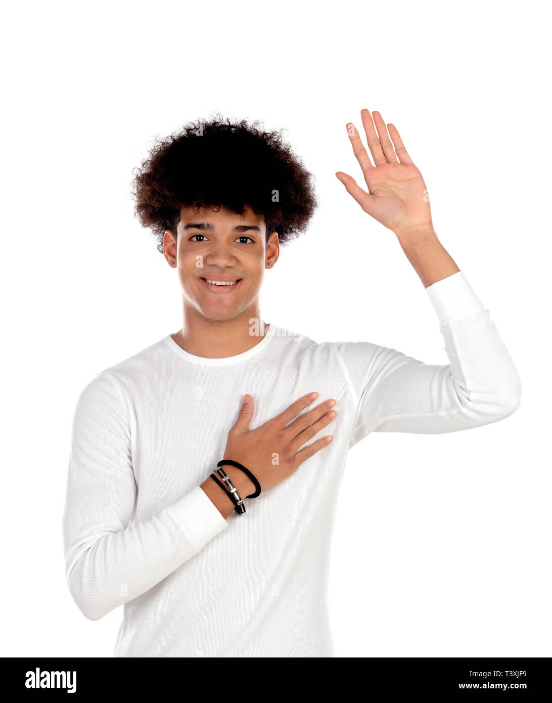 Handsome afro guy with his right hand on the heart and raising the ...