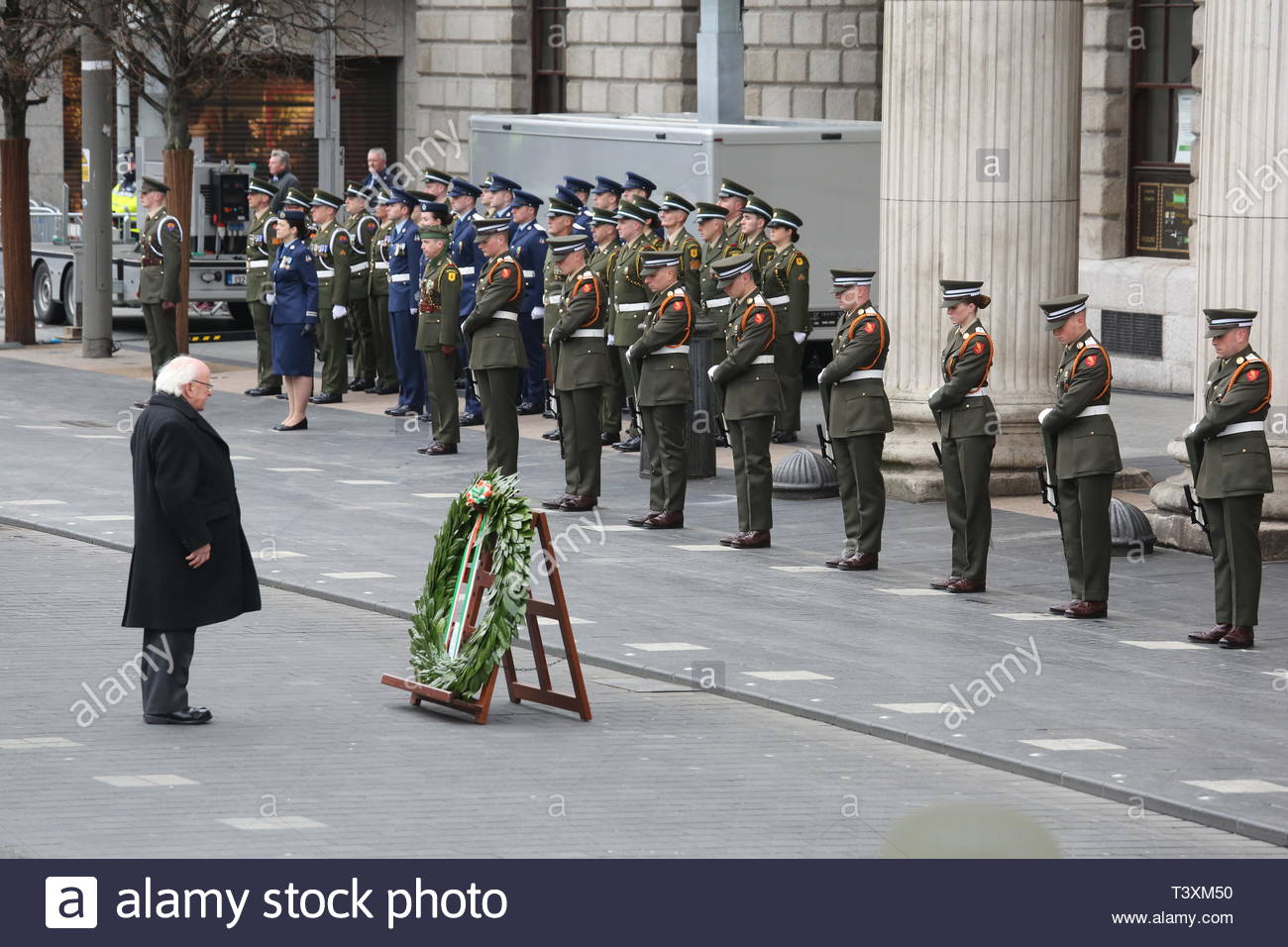 President Higgins bows in front of the GPO Dublin as the Easter 1916 ...