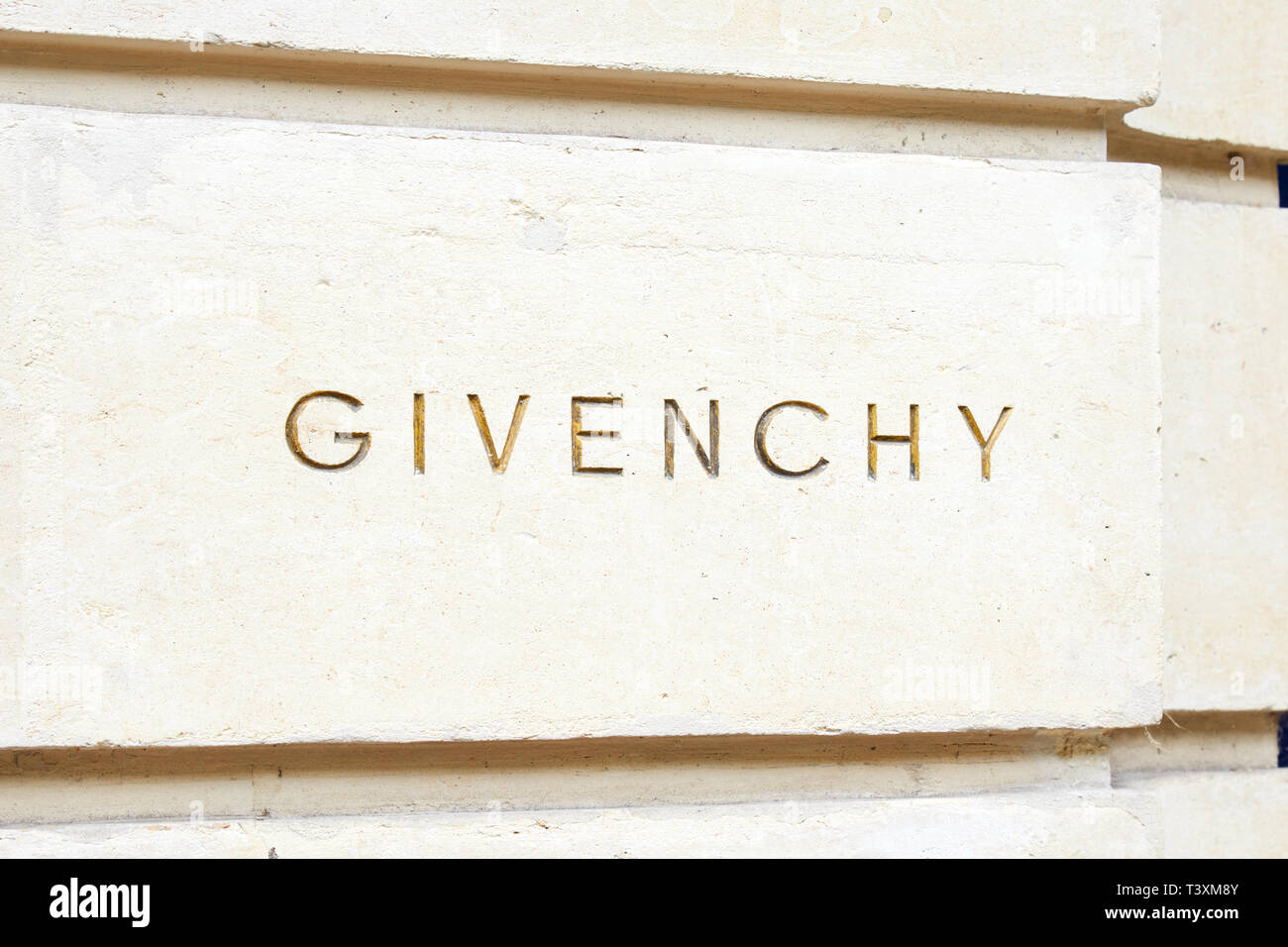 PARIS, FRANCE - JULY 22, 2017: Givenchy, luxury fashion sign carved in ...