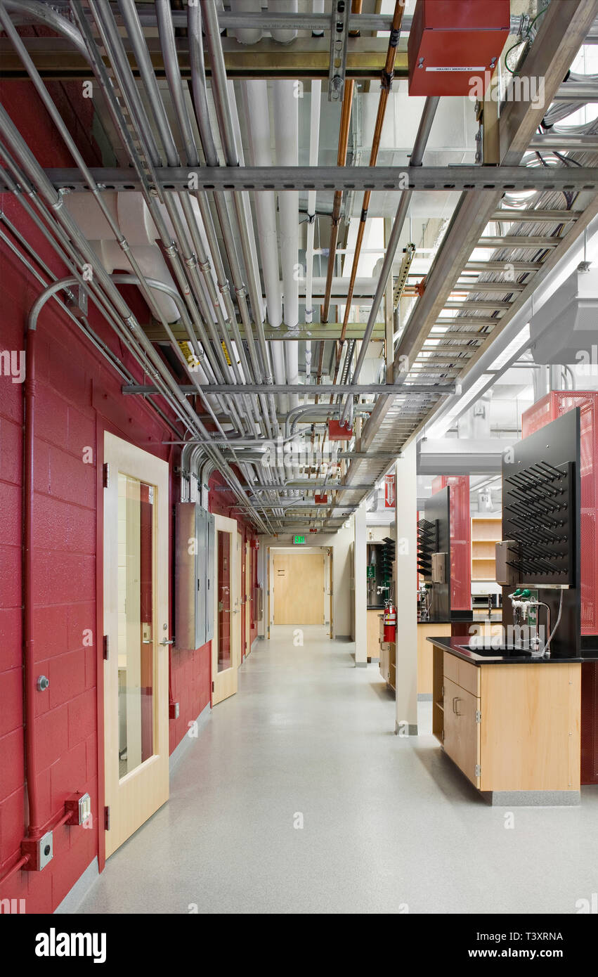 Exposed pipes in laboratory corridor Stock Photo - Alamy