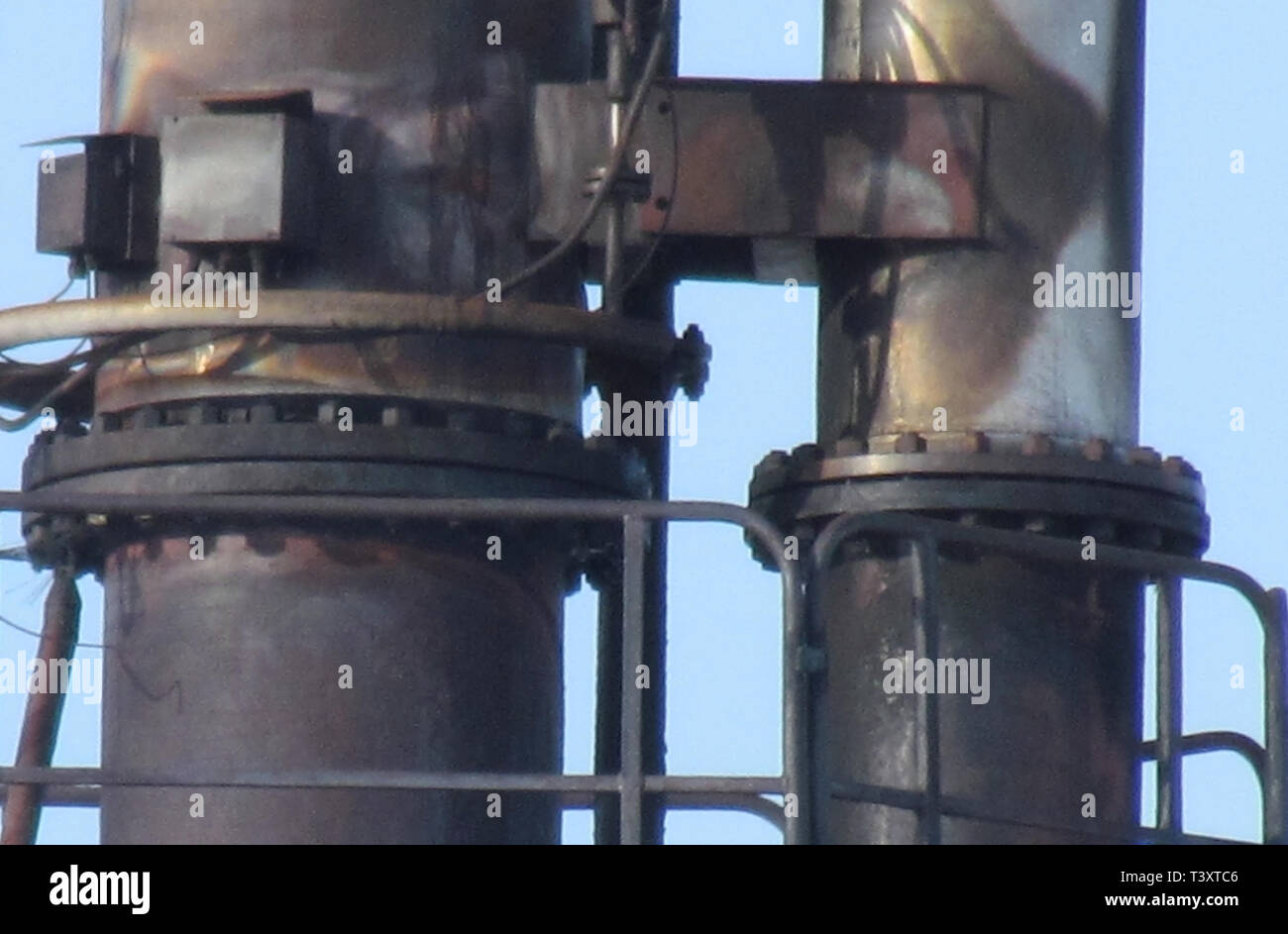 Flange connections on gas flaring. Burning through a torch head Stock ...