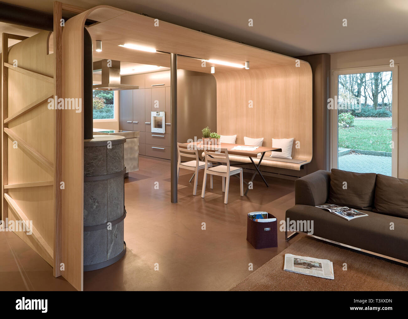 Sofa, dining table and chairs in modern home Stock Photo - Alamy