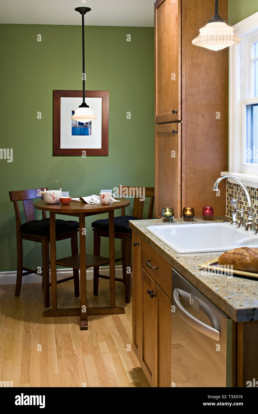 Table and chairs in modern kitchen Stock Photo - Alamy