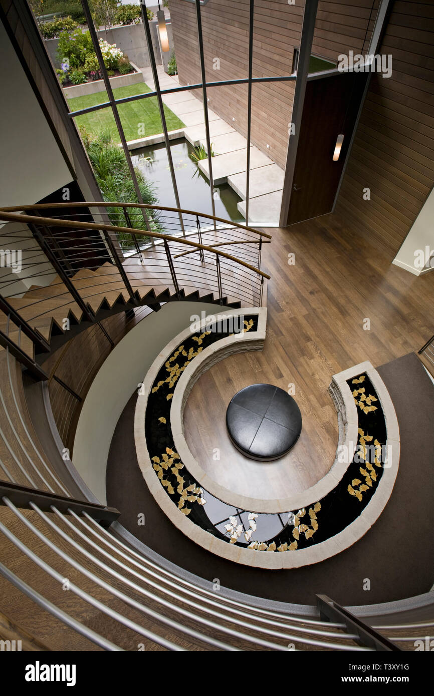 Overhead view of pond in modern foyer Stock Photo - Alamy