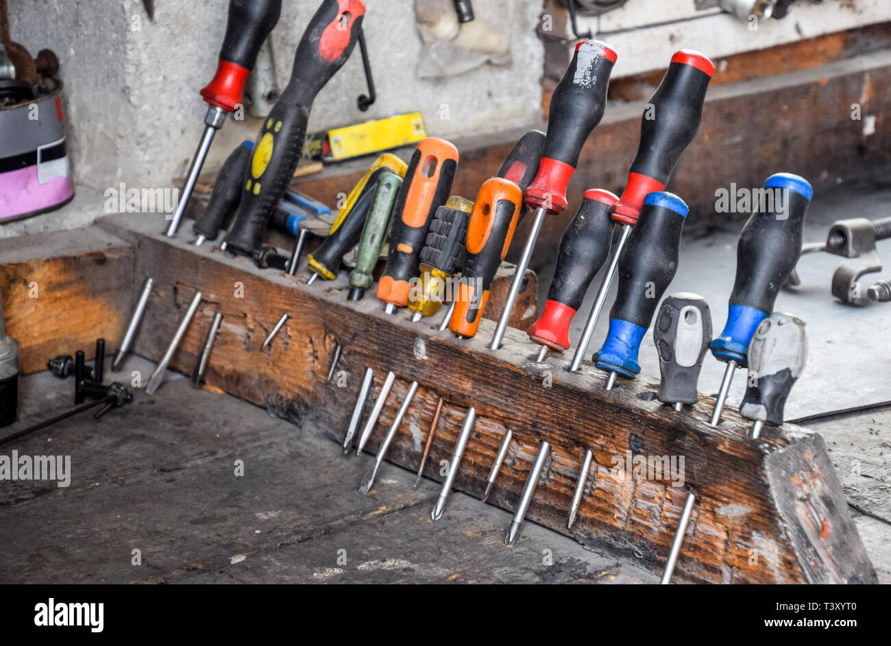 Screwdrivers and other tools in the car garage Stock Photo - Alamy