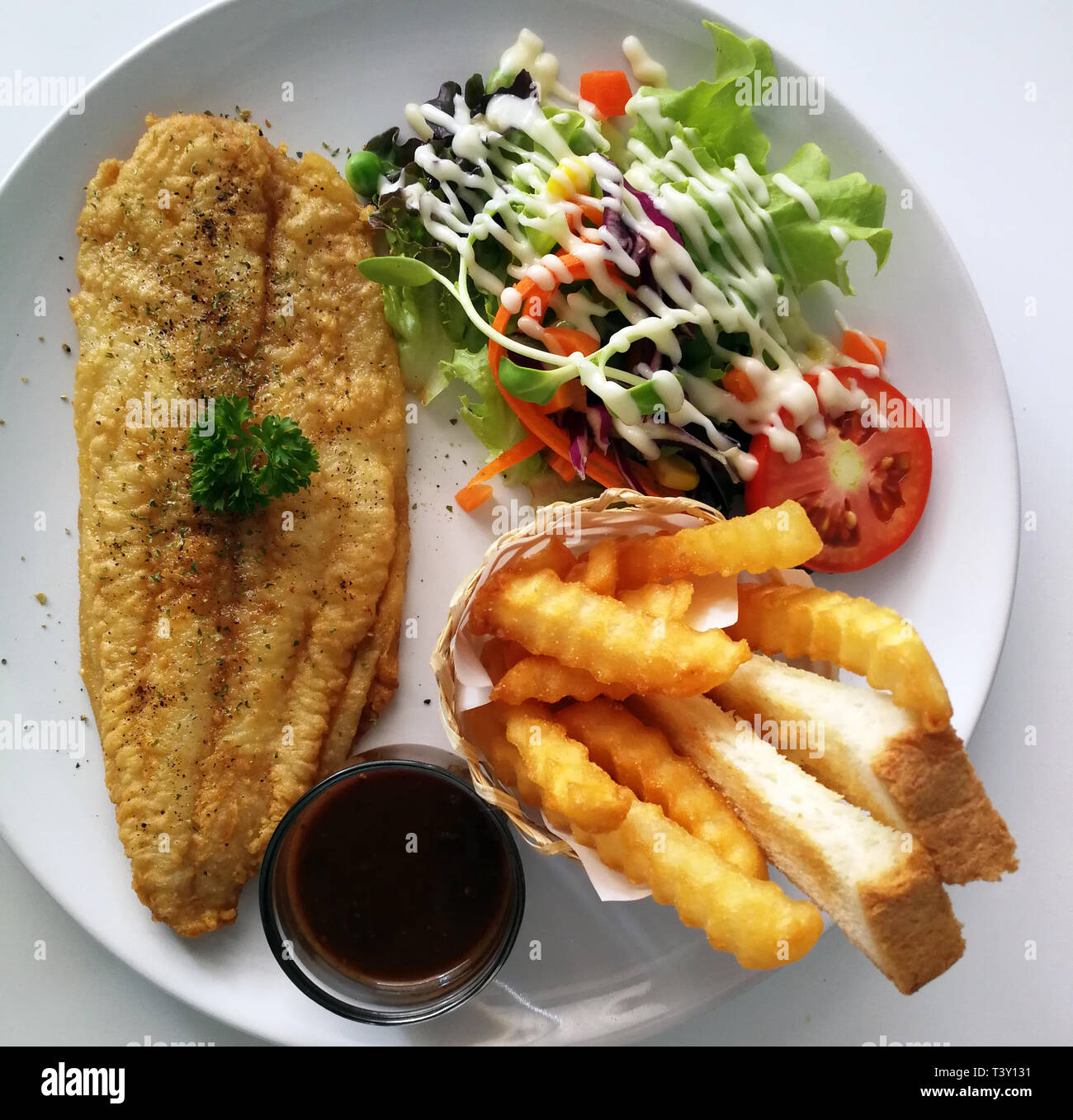 Deep Fried Dolly Fish Steak with French fries set Stock Photo - Alamy